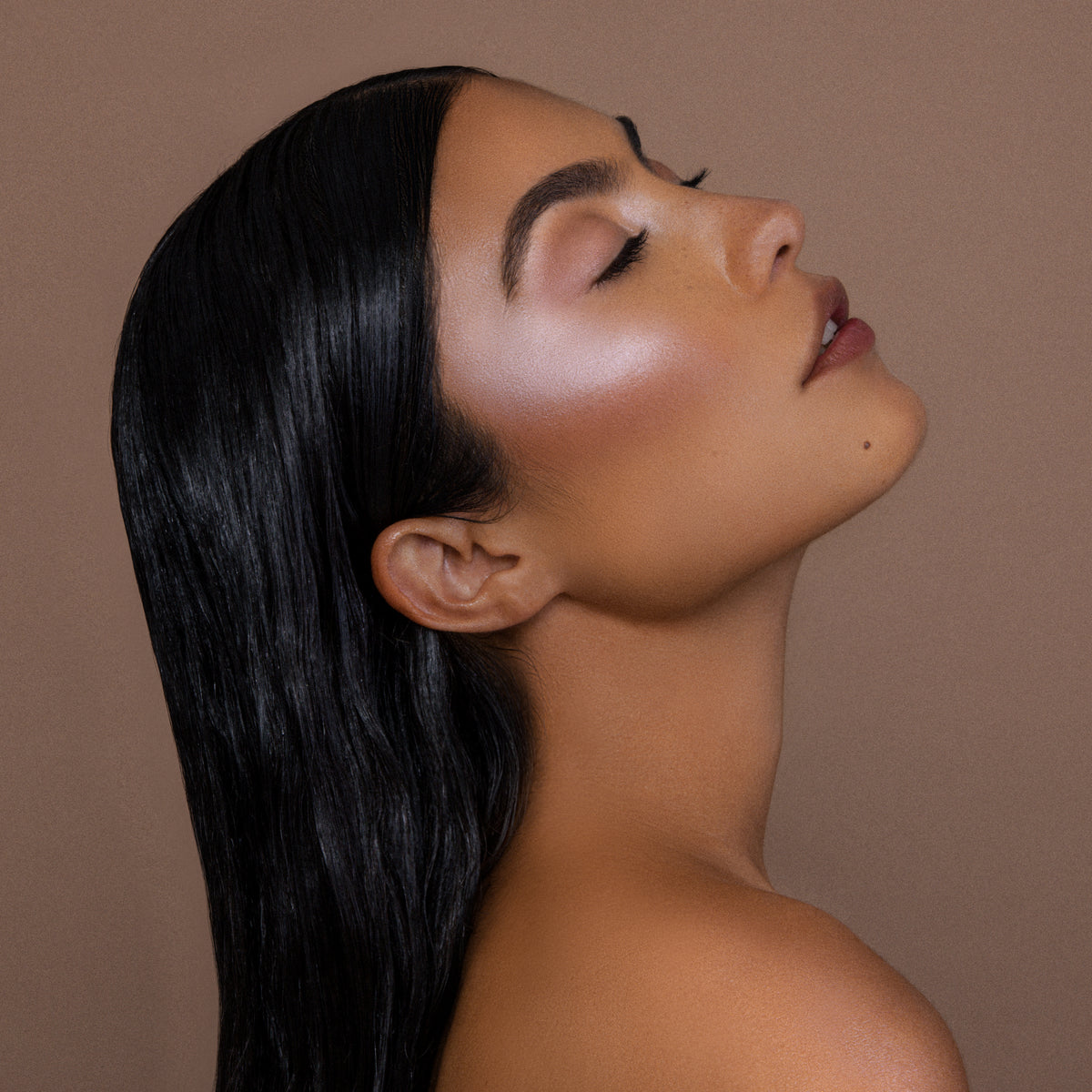 Eris: Medium Deep Foundation with Gold Undertones